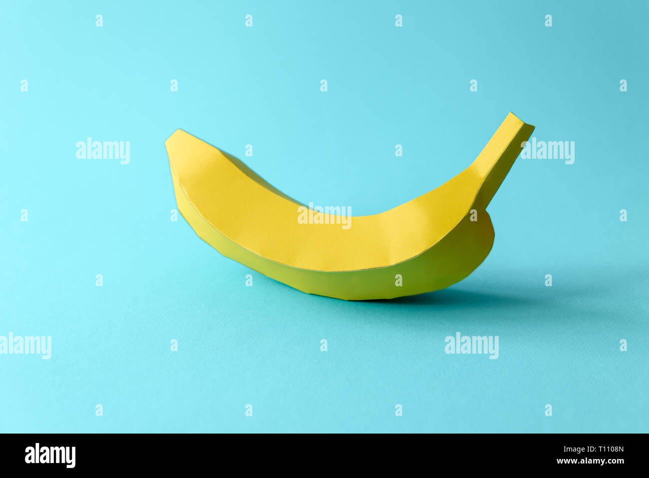 Paper banana on blue pastel background. Creative idea. Art food concept ...