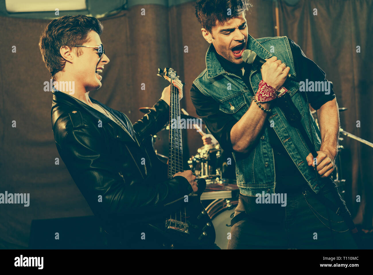 Two musicians play electric hi-res stock photography and images - Alamy