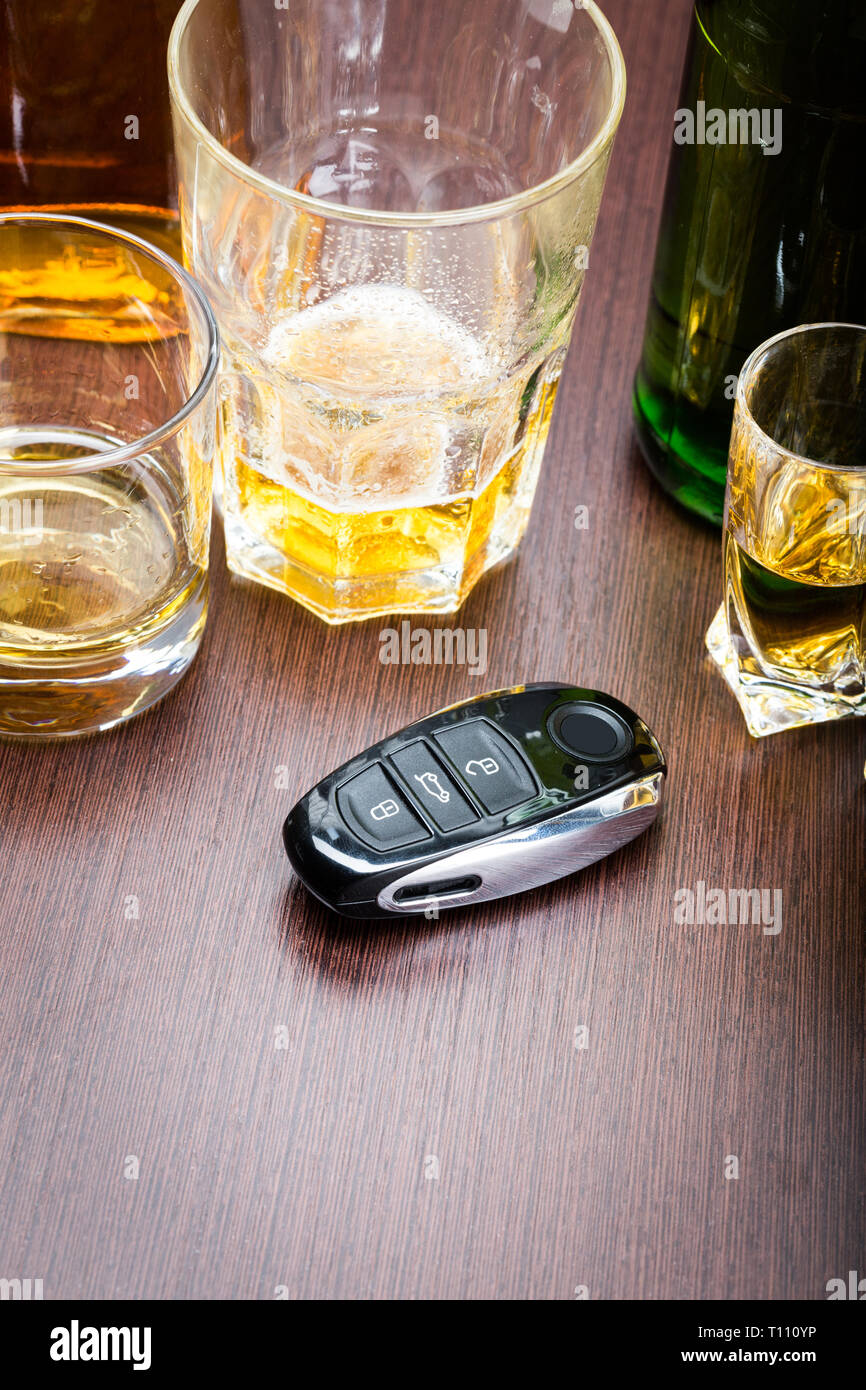 Car key on the bar with spilled alcohol Stock Photo - Alamy