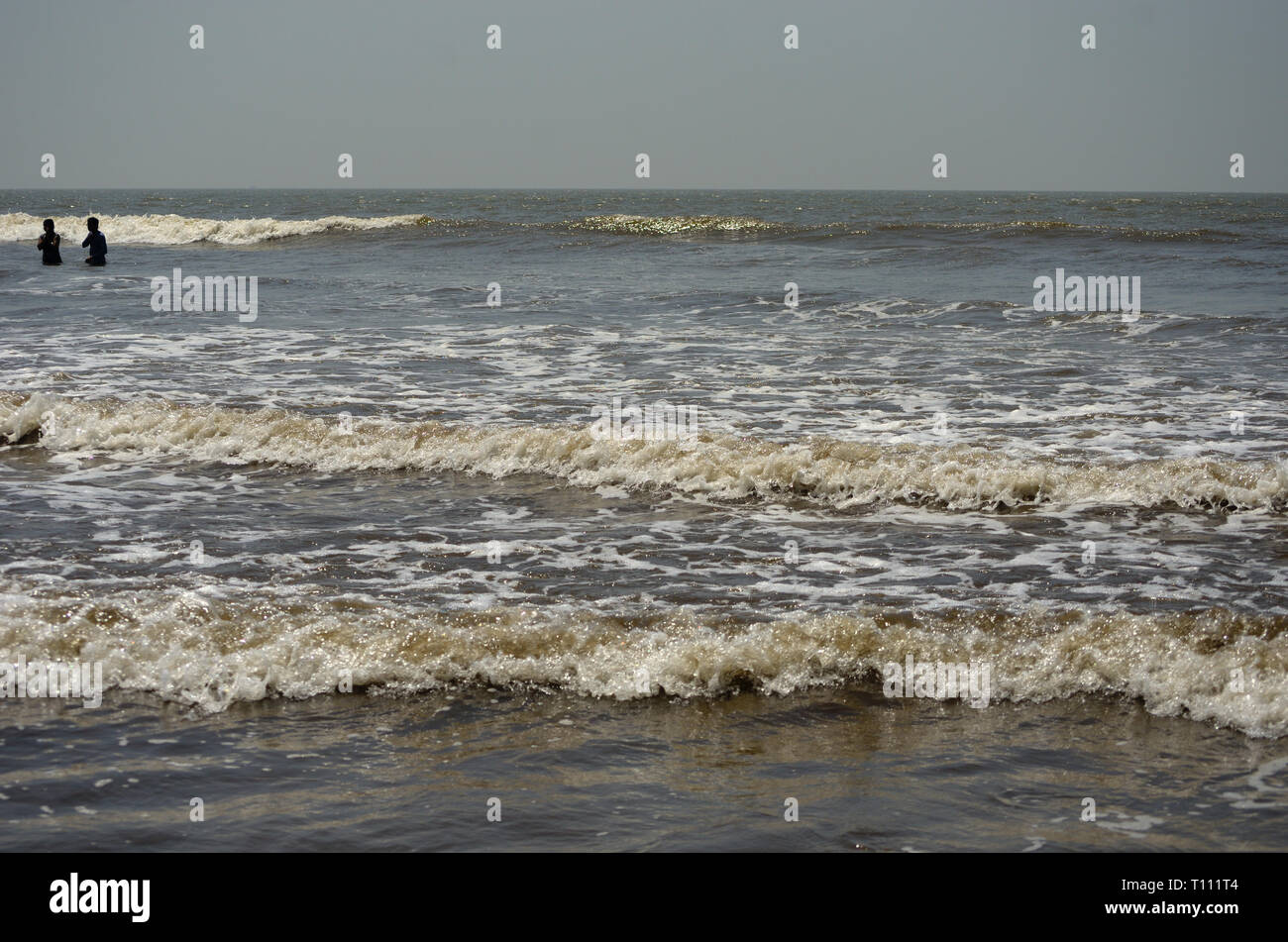 Clean water waves on beach Stock Photo - Alamy