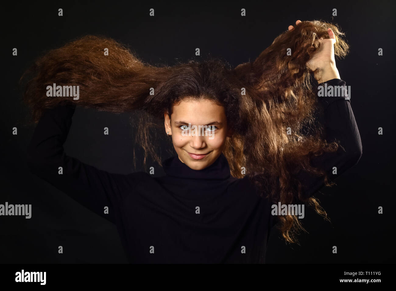 Curly hair movement hi-res stock photography and images - Alamy