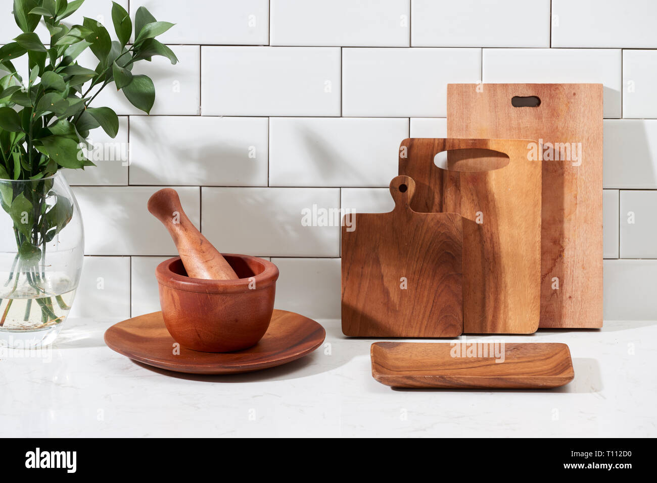 Still life with kitchen wooden utensils on white background Stock Photo ...