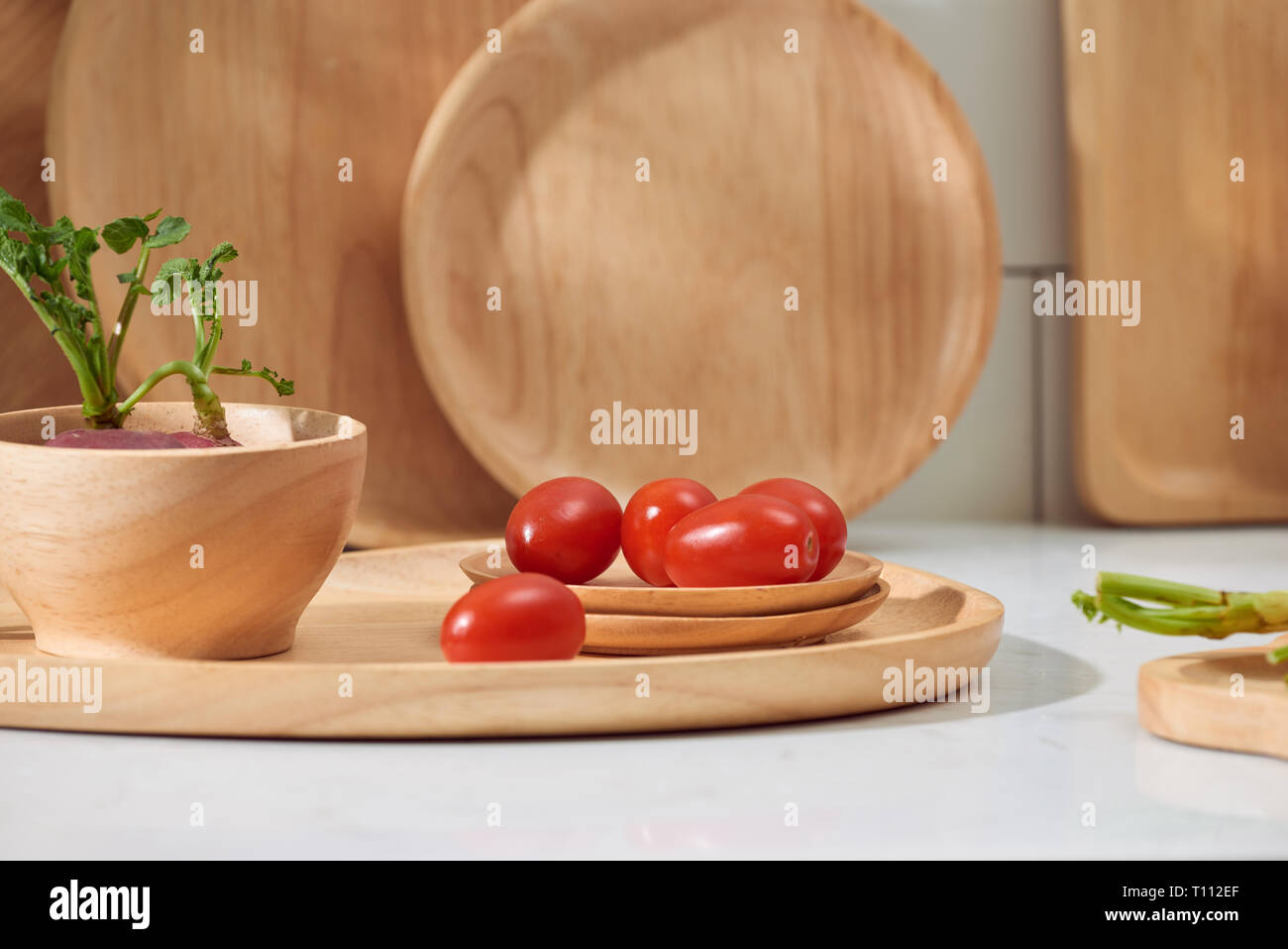 Kitchen utensils with fresh vegetable and fruit on the table. Kitchen ...