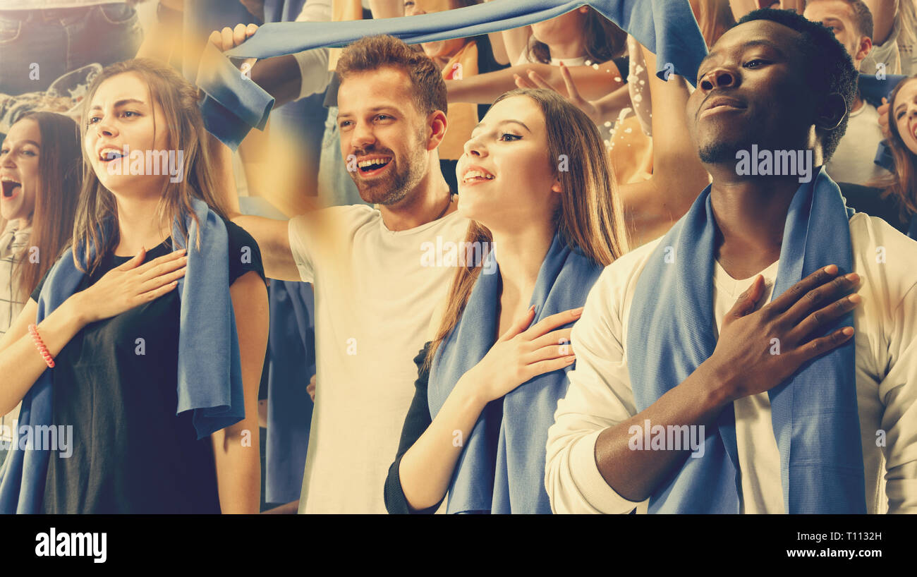 Group of happy fans are cheering for their team victory Stock Photo - Alamy