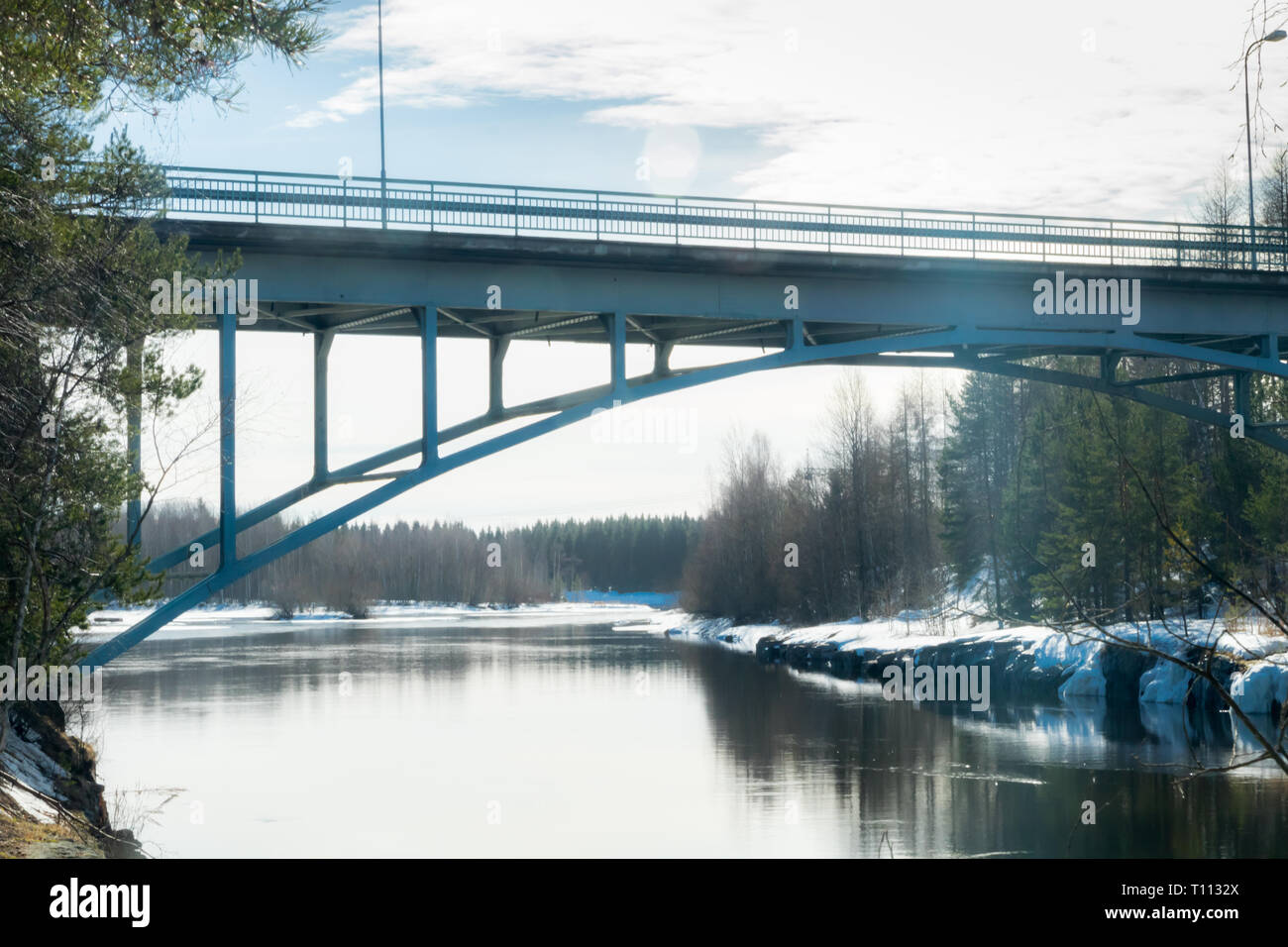 Spring landscape of bridge and Kymijoki river waters in Finland ...