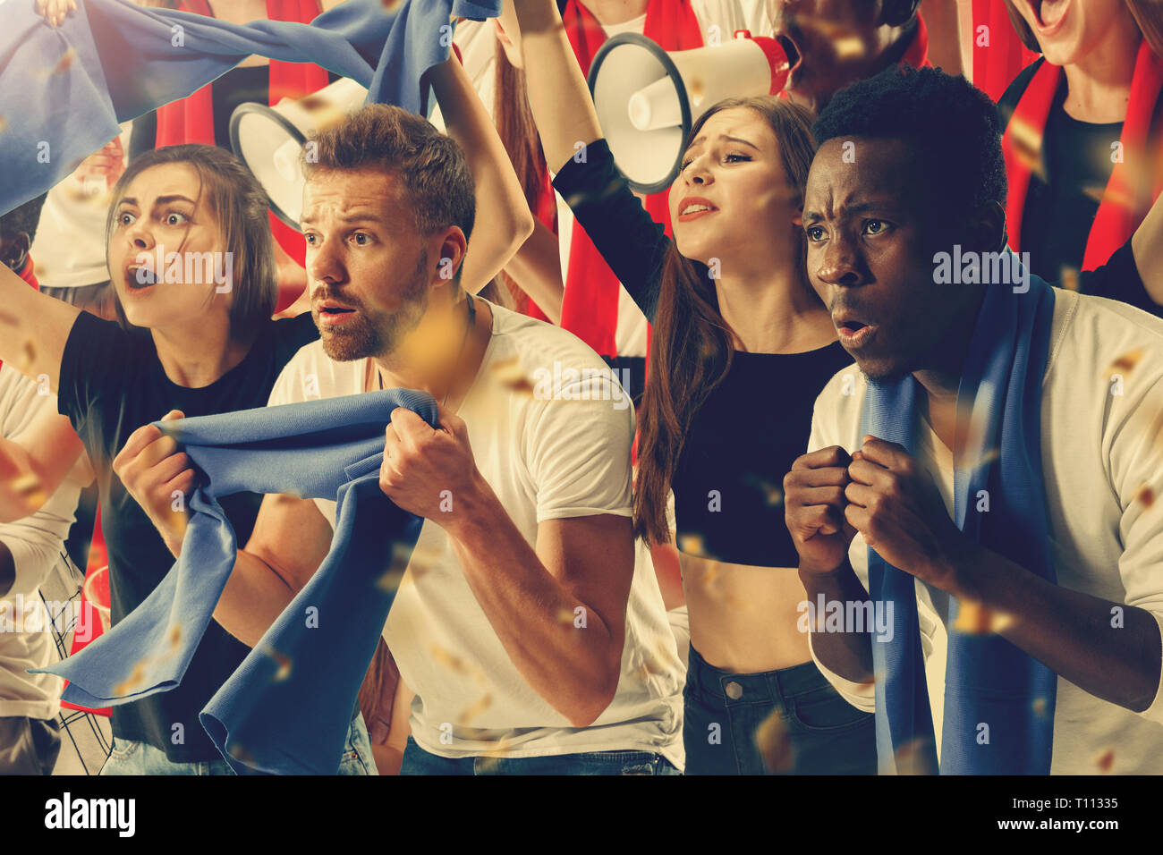 Group of happy fans are cheering for their team victory Stock Photo - Alamy