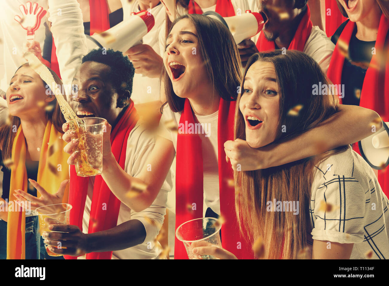 Group of happy fans are cheering for their team victory. Collage made ...