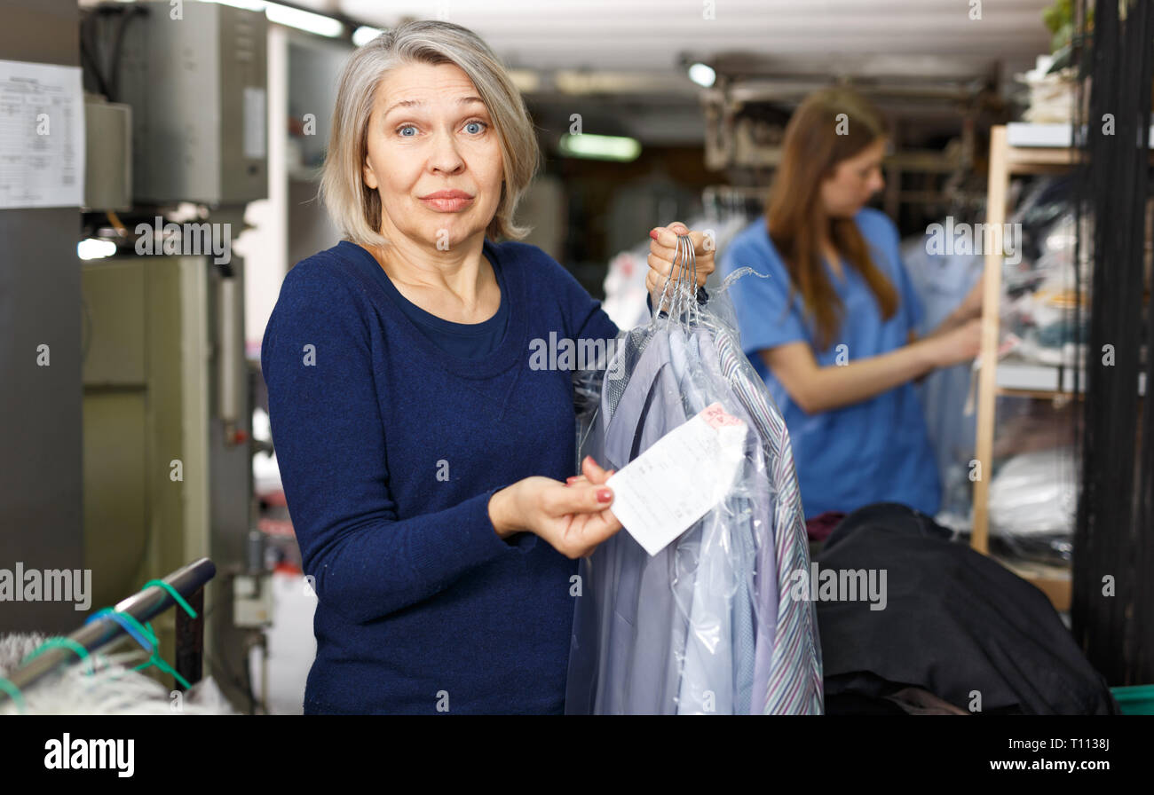 Clothes laundry service counter hi-res stock photography and images - Alamy