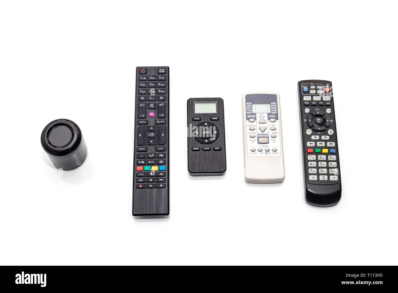 Universal ir and wifi remote with voice activation next to old ...