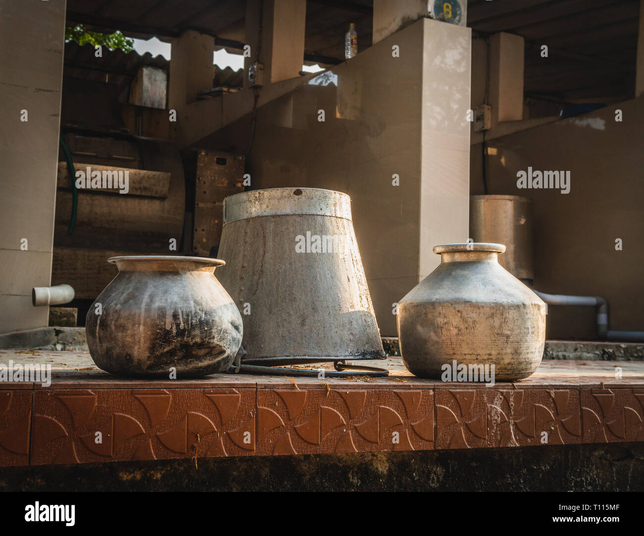 classic indian pot for water at the sun in the street Stock Photo - Alamy
