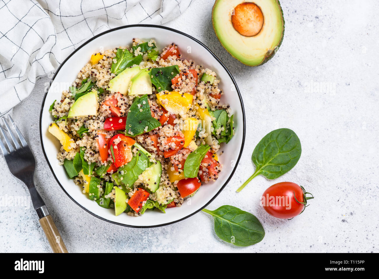 Quinoa salad with fresh vegetables on white Stock Photo - Alamy