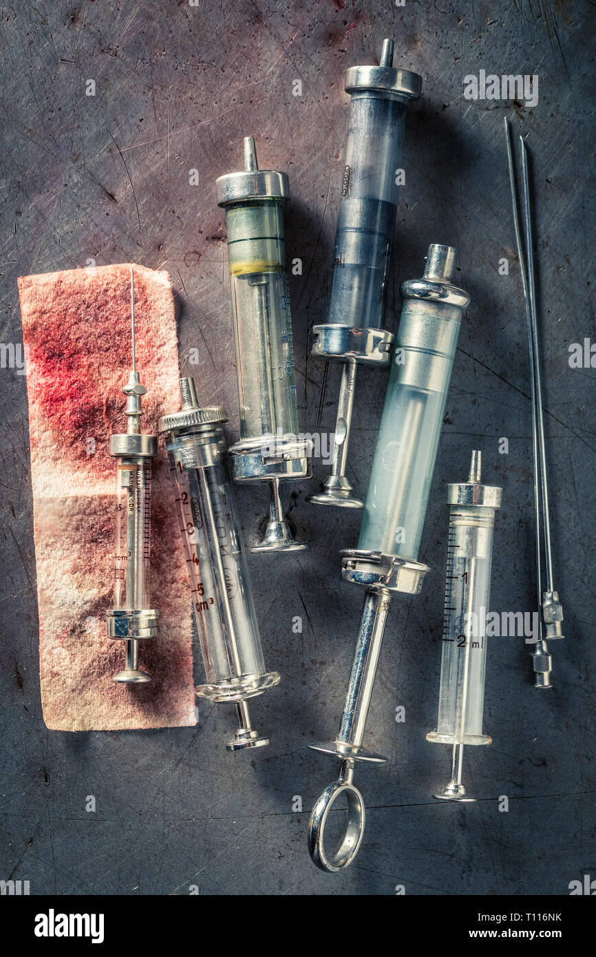 Old needle and syringes prepared for blood test Stock Photo - Alamy