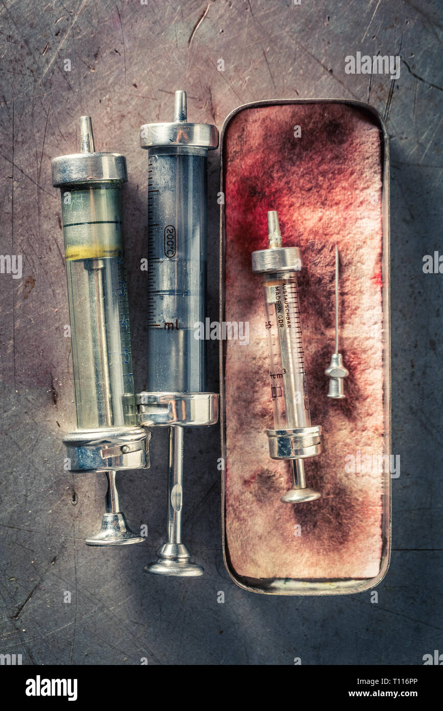 Antique needle and syringes prepared for blood test Stock Photo - Alamy