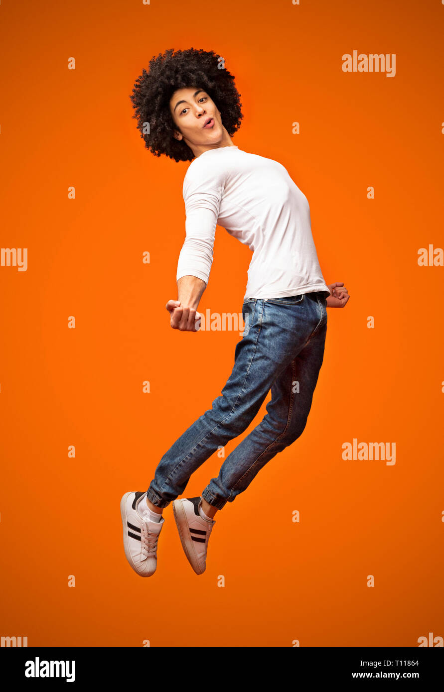 Levitation excited young man hi-res stock photography and images - Alamy