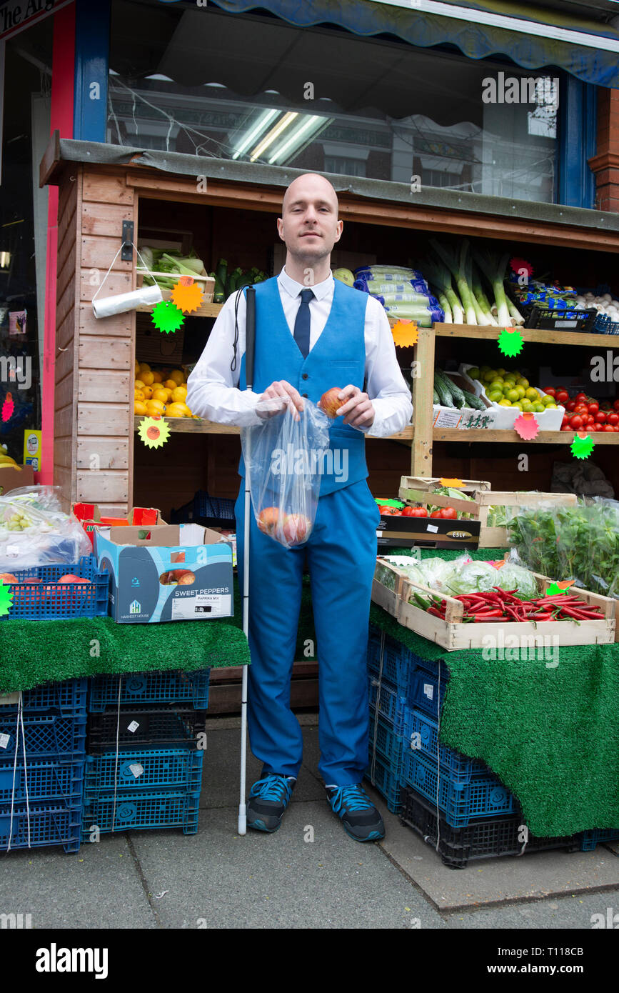 Blind man with a stick hi-res stock photography and images - Alamy