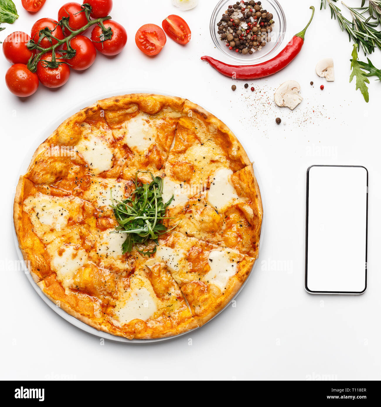 Pizza delivery. Order online with smartphone, top view Stock Photo - Alamy