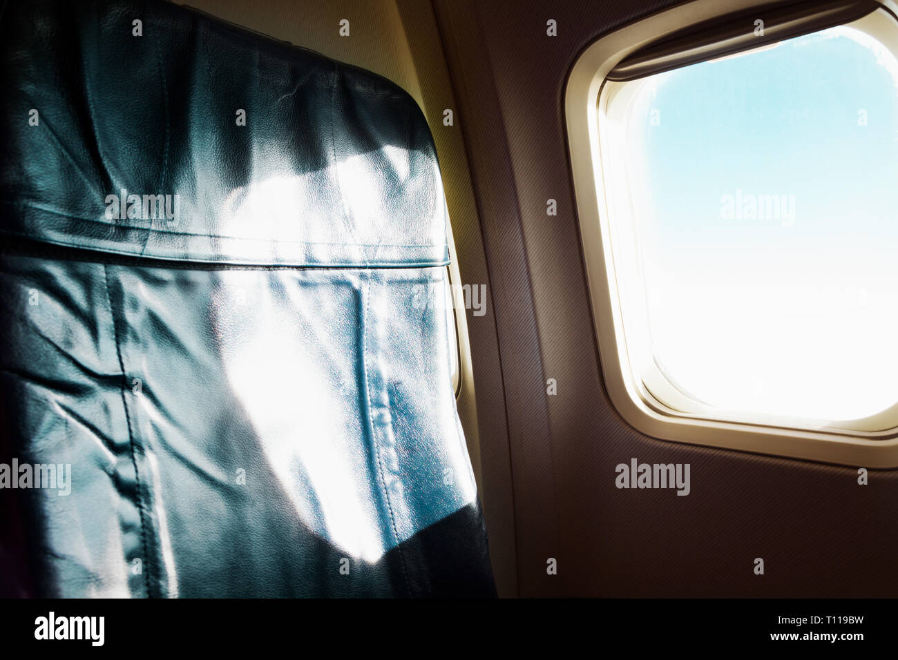 airplane interior passenger seat and window Stock Photo - Alamy