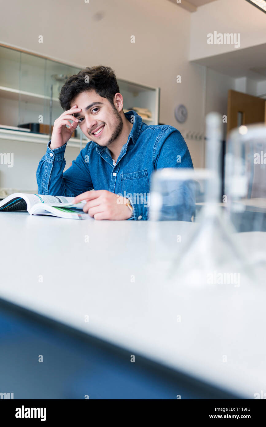 a male student in the science lab Stock Photo - Alamy
