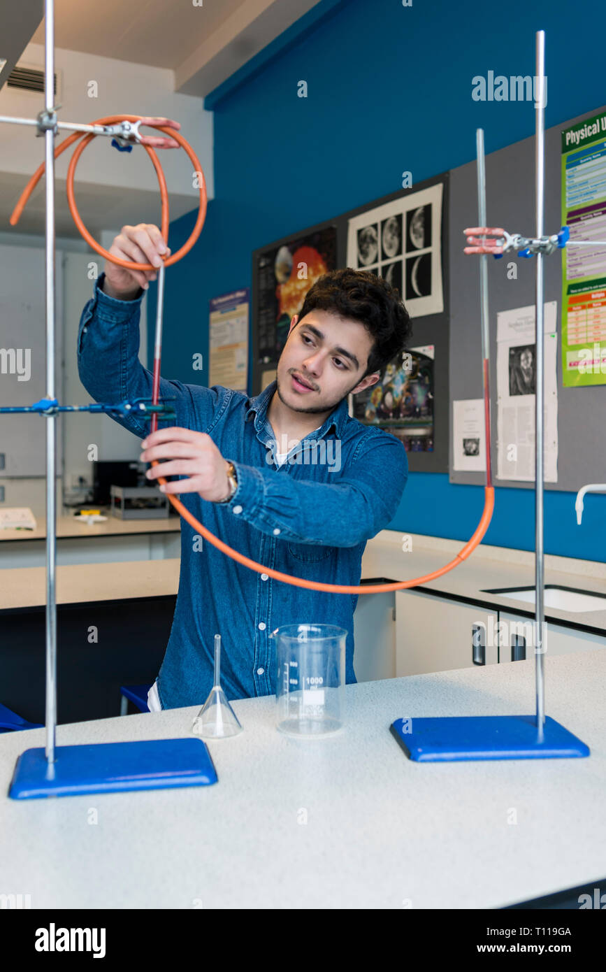 a male student in the science lab Stock Photo - Alamy