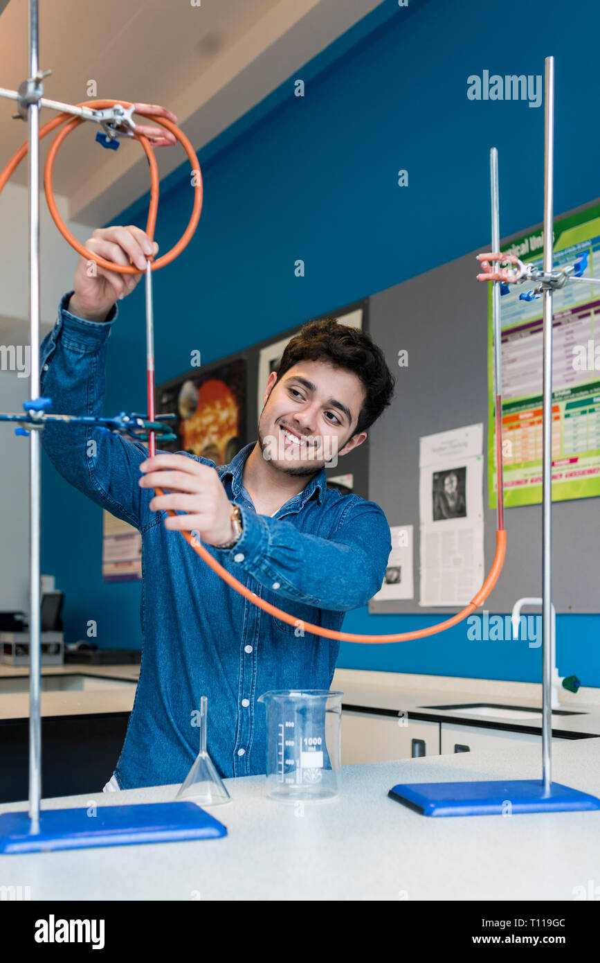 a male student in the science lab Stock Photo - Alamy