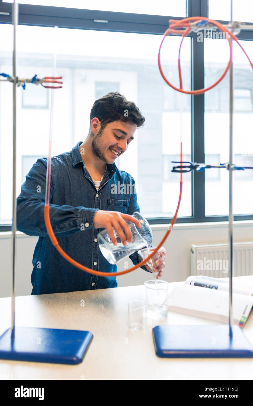 a male student in the science lab Stock Photo - Alamy