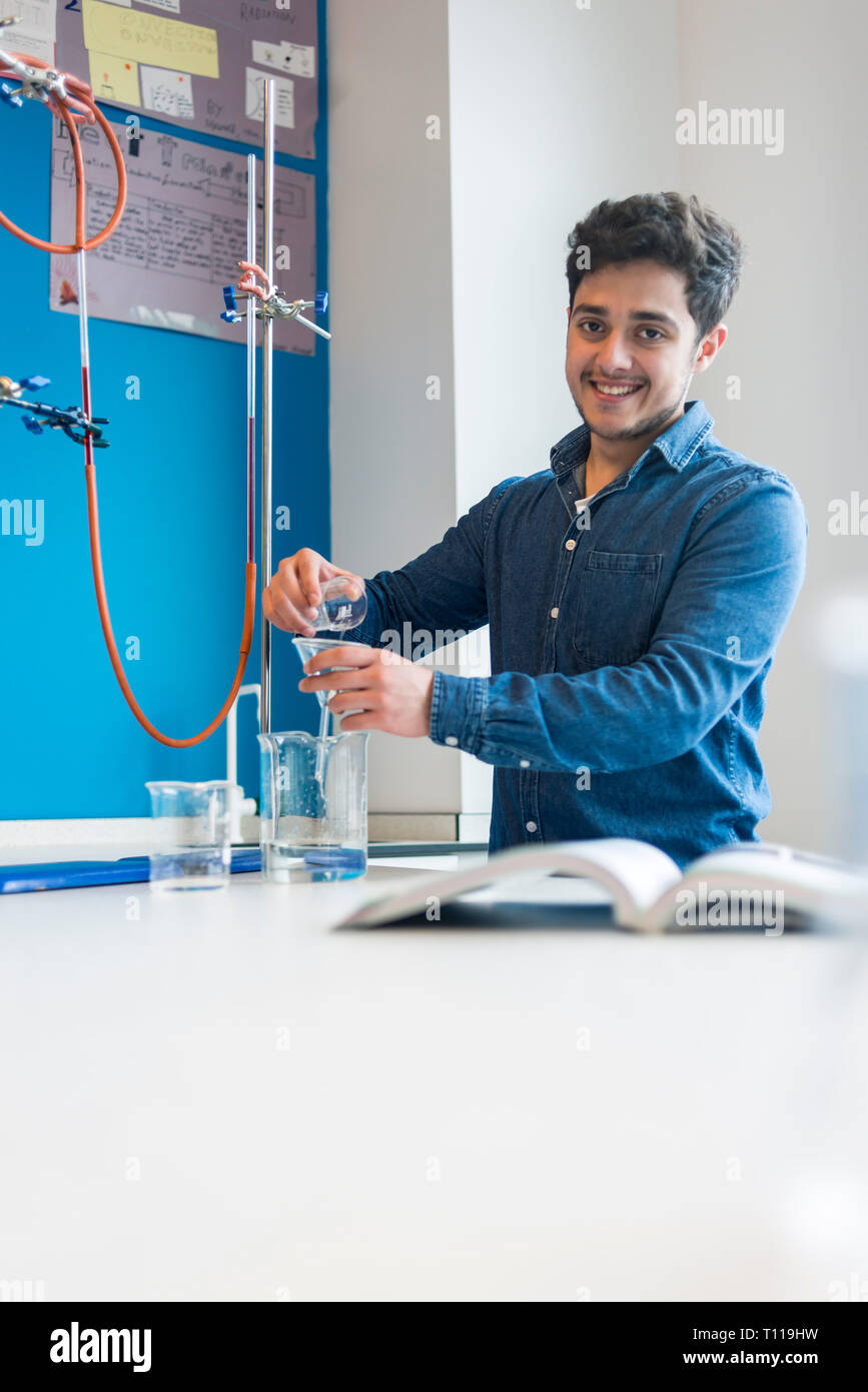 a male student in the science lab Stock Photo - Alamy