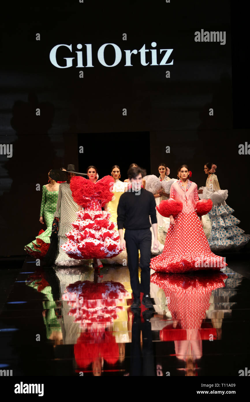 Designer Gil Ortiz and models on the catwalk Stock Photo - Alamy