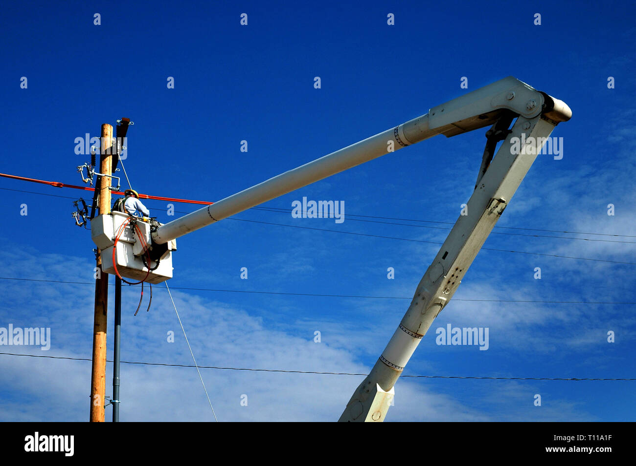 Electric powerlines working hi-res stock photography and images - Alamy