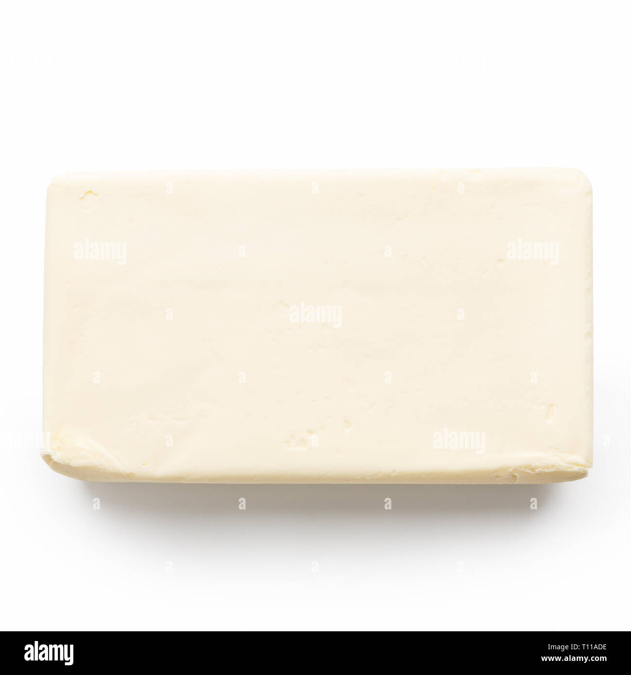 Block of butter on white Stock Photo - Alamy