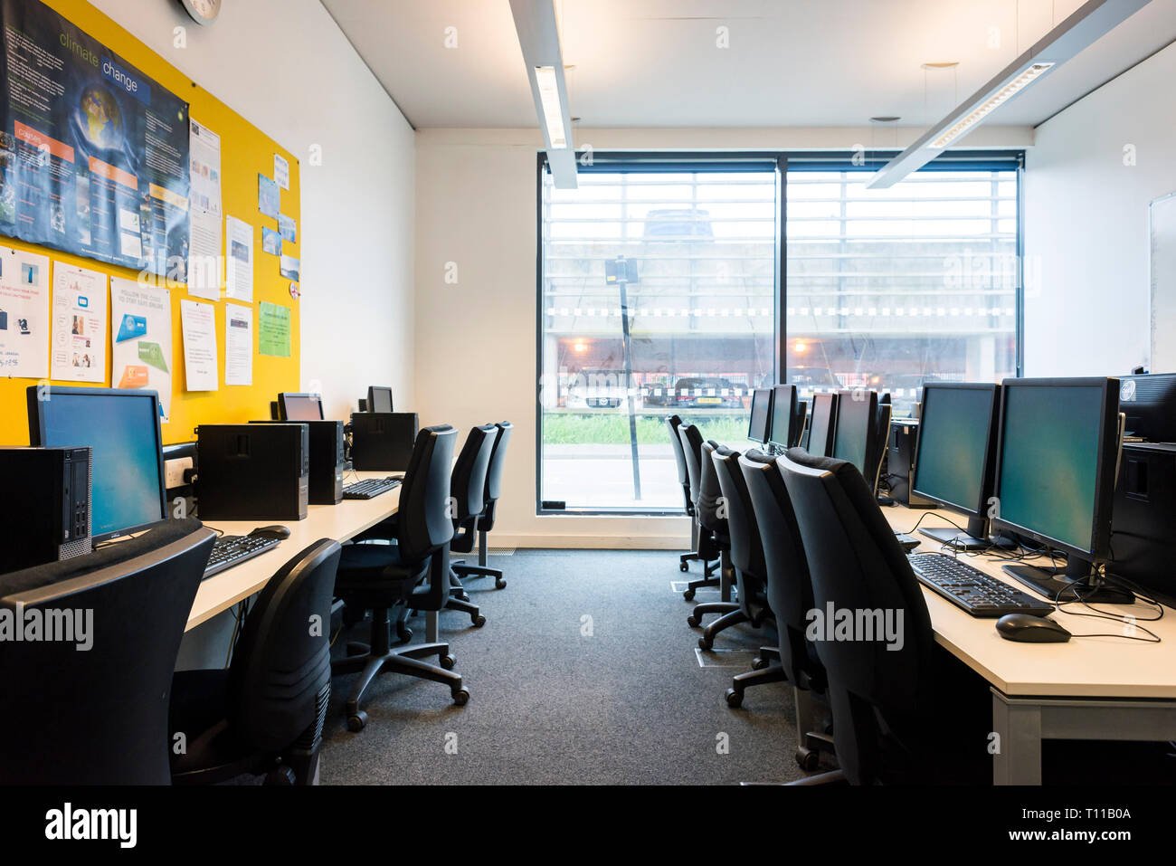 a bright modern empty classroom with lots of computers for learning Stock Photo - Alamy