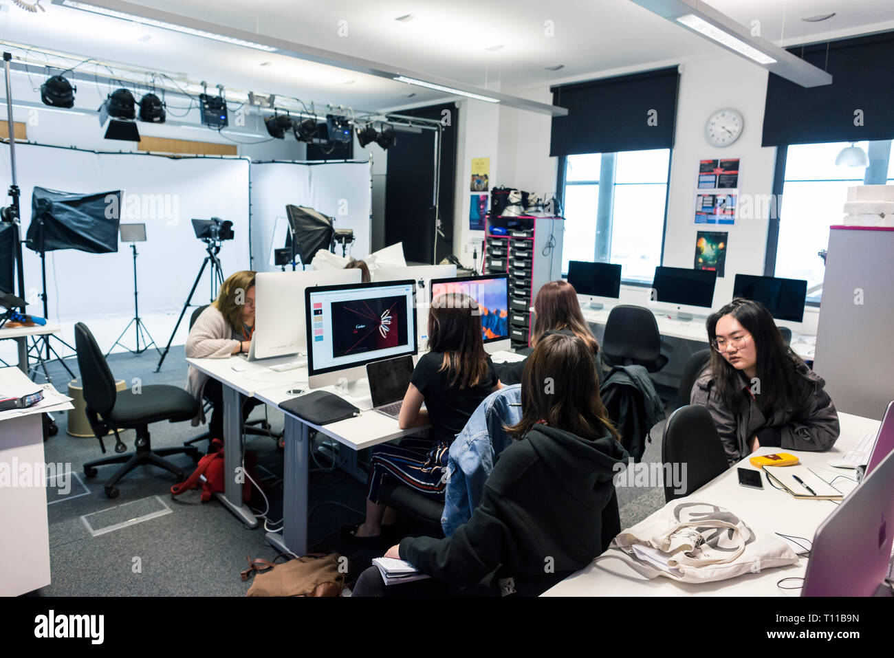 a media studies classroom full of students learning during a lesson ...
