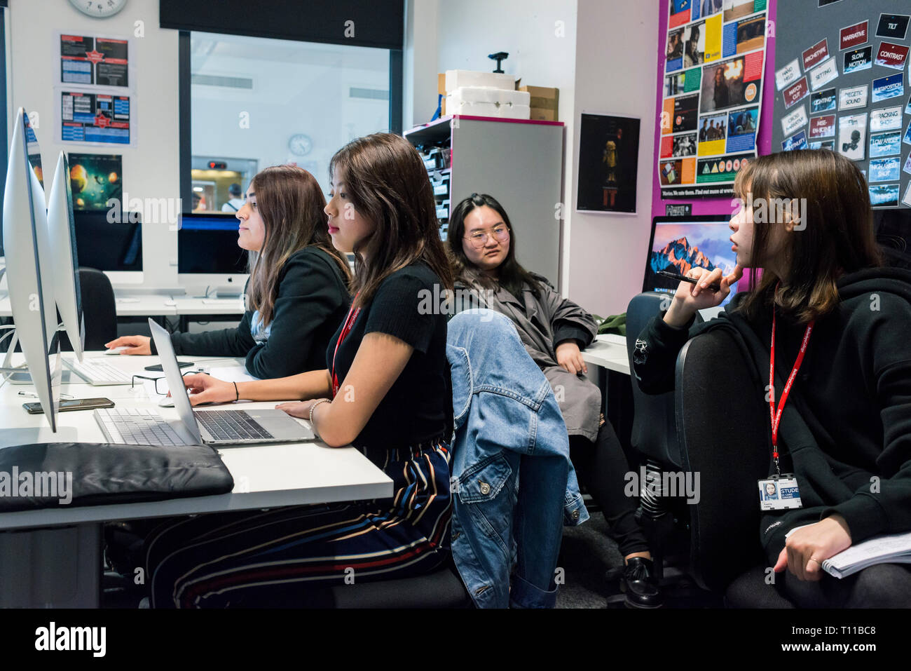 a media studies classroom full of students learning during a lesson ...