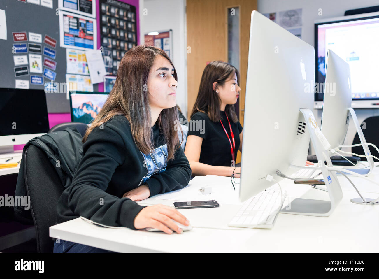 a media studies classroom full of students learning during a lesson ...