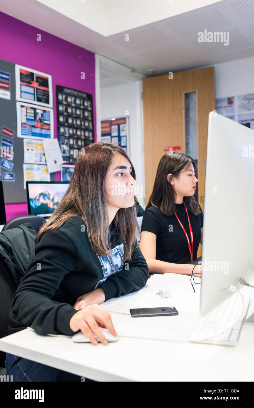 a media studies classroom full of students learning during a lesson ...