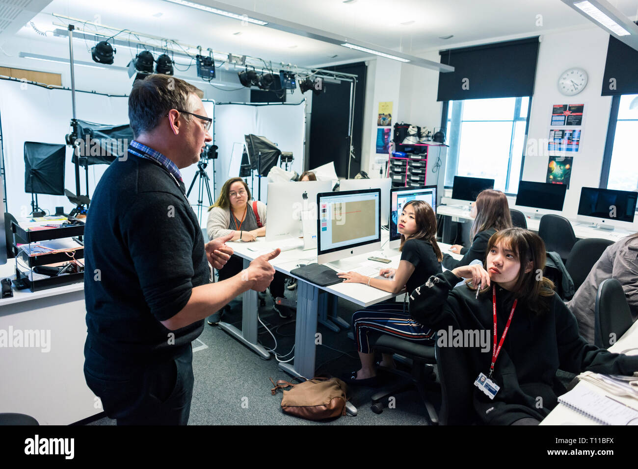 a media studies classroom full of students learning during a lesson ...