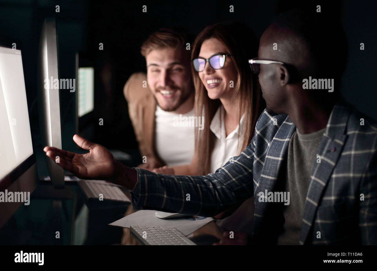 employees discussing new information Stock Photo - Alamy