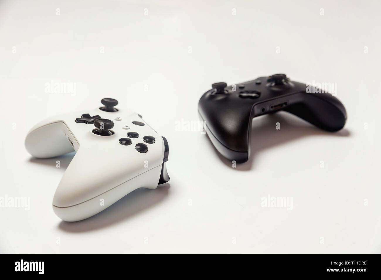 White and black two joystick gamepad, game console isolated on white ...