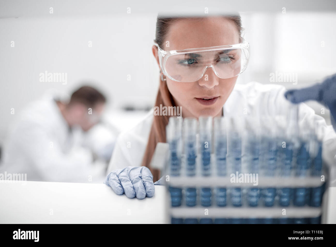 close up.scientist with vial Stock Photo - Alamy