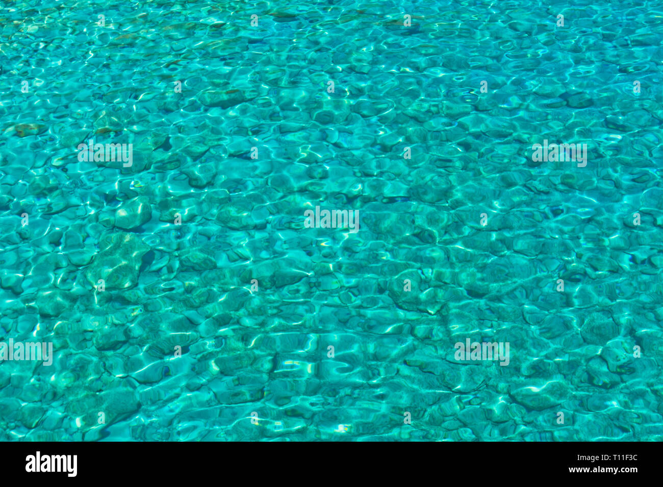 Crystal clear blue water of Marmara beach, near Aradena gorge, island ...