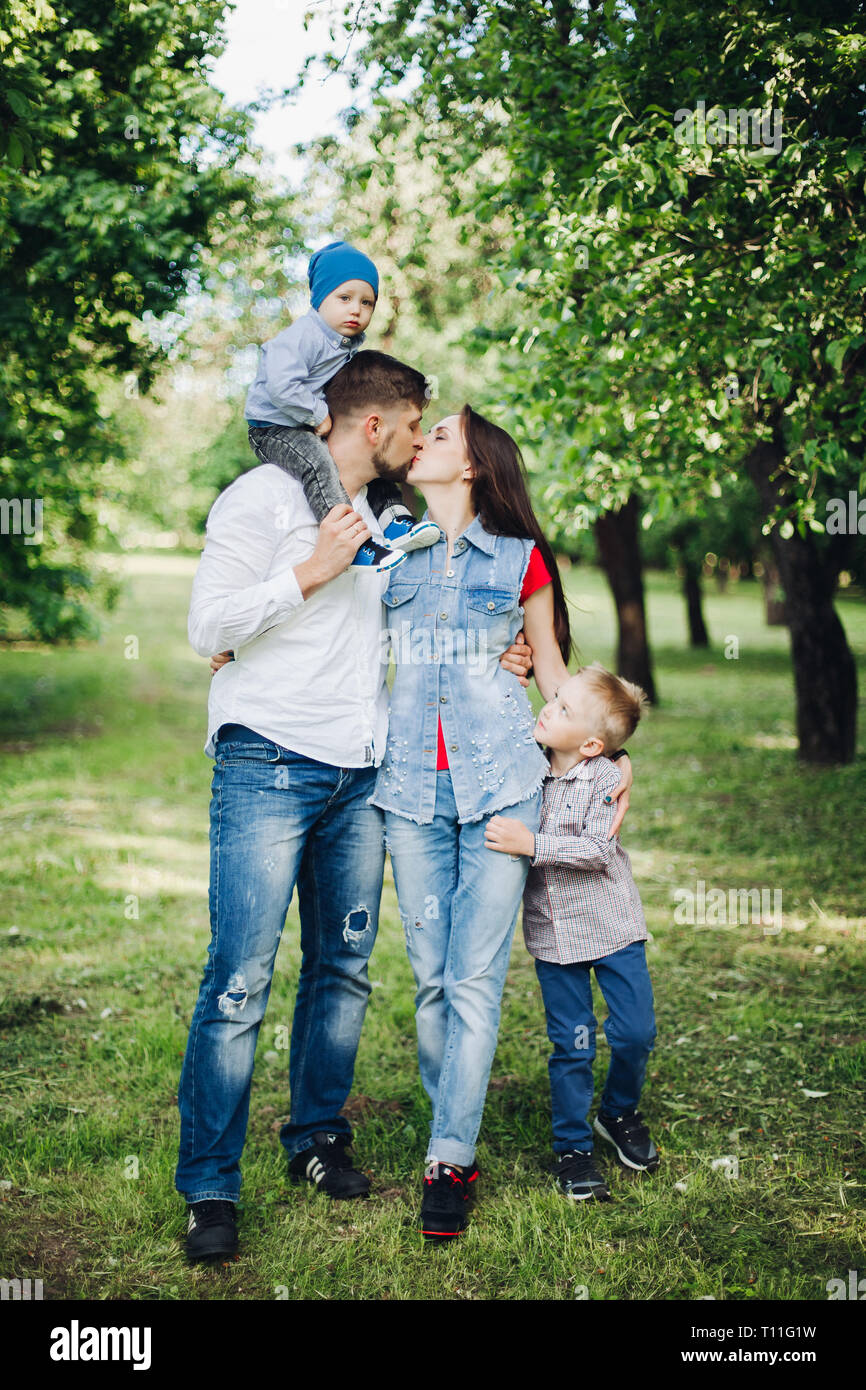 Portrait of happy family, wearing in casual clothes, spending time ...