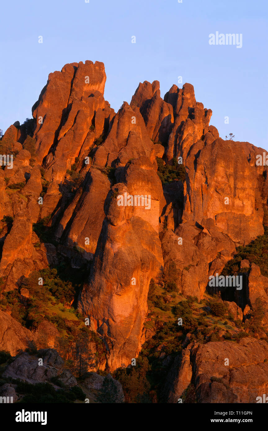 USA, California, Pinnacles National Park, Sunset reddens spires and ...