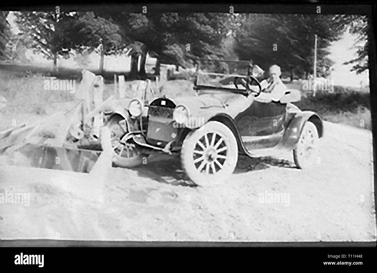 Classic car driver pose Black and White Stock Photos & Images - Alamy