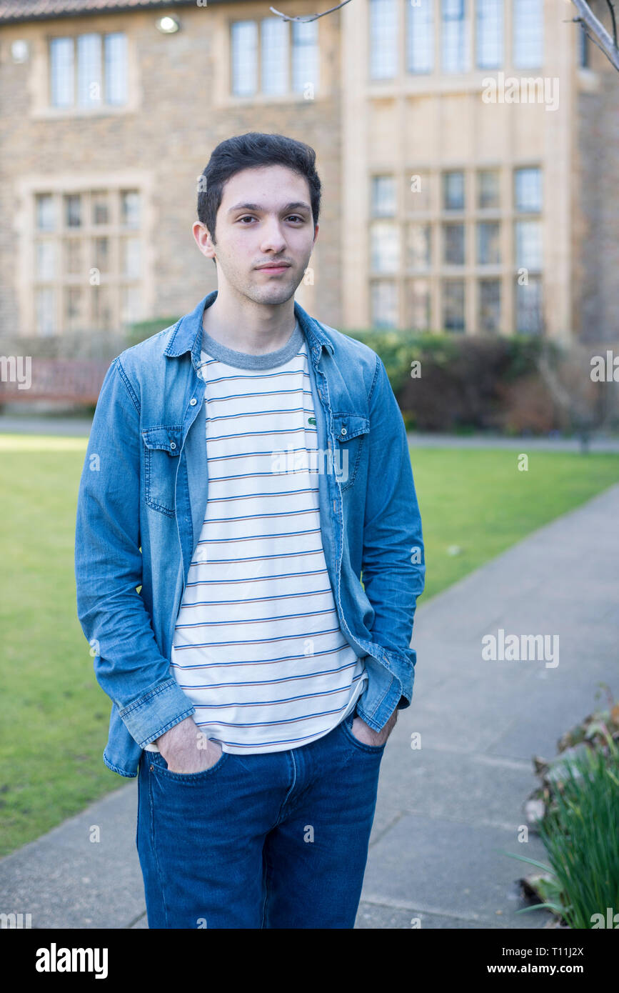 An arabic student from the Middle East outside in a traditional ...