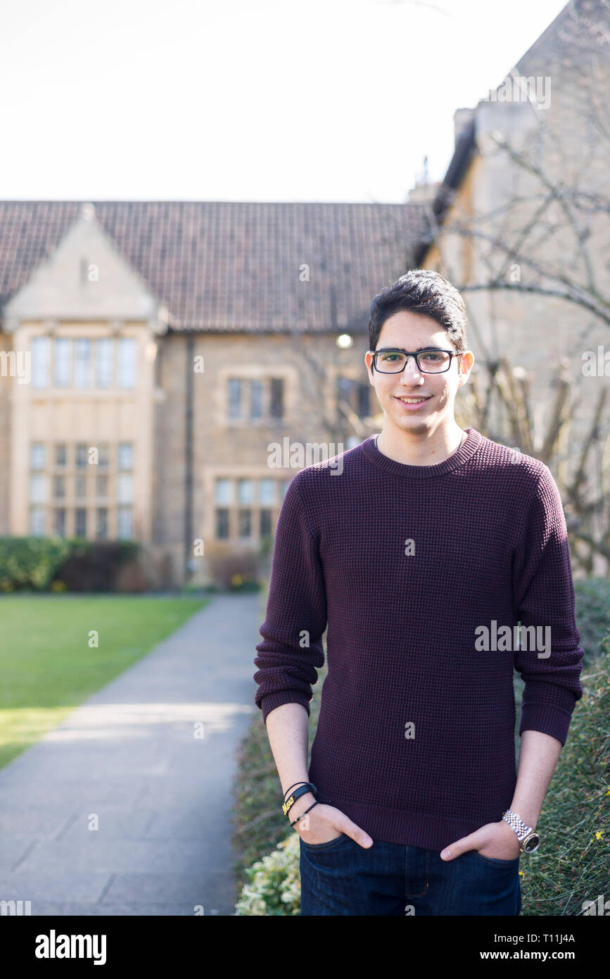 An arabic student from the Middle East outside in a traditional ...
