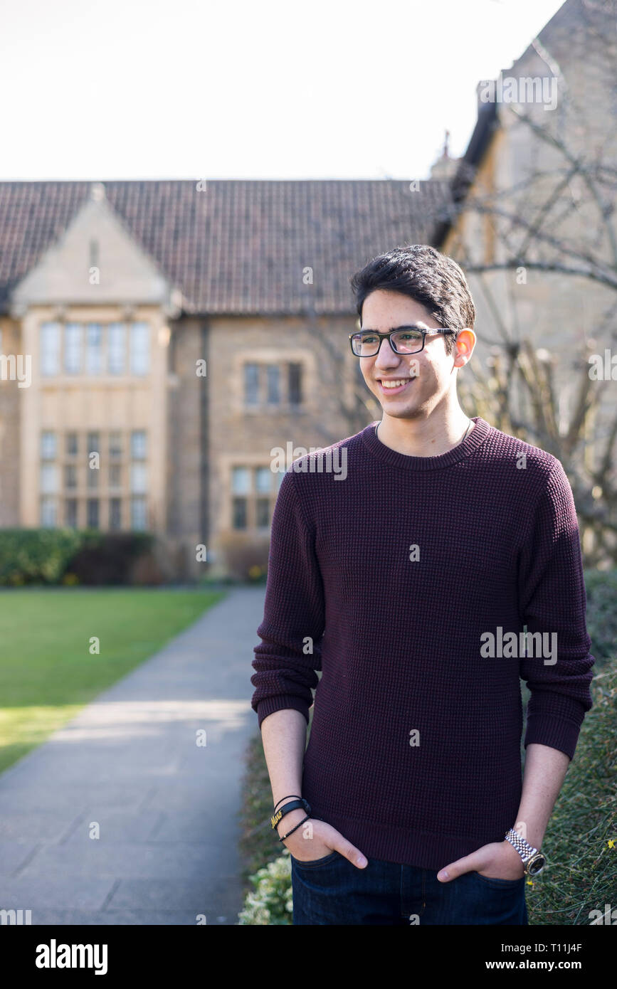 An arabic student from the Middle East outside in a traditional ...