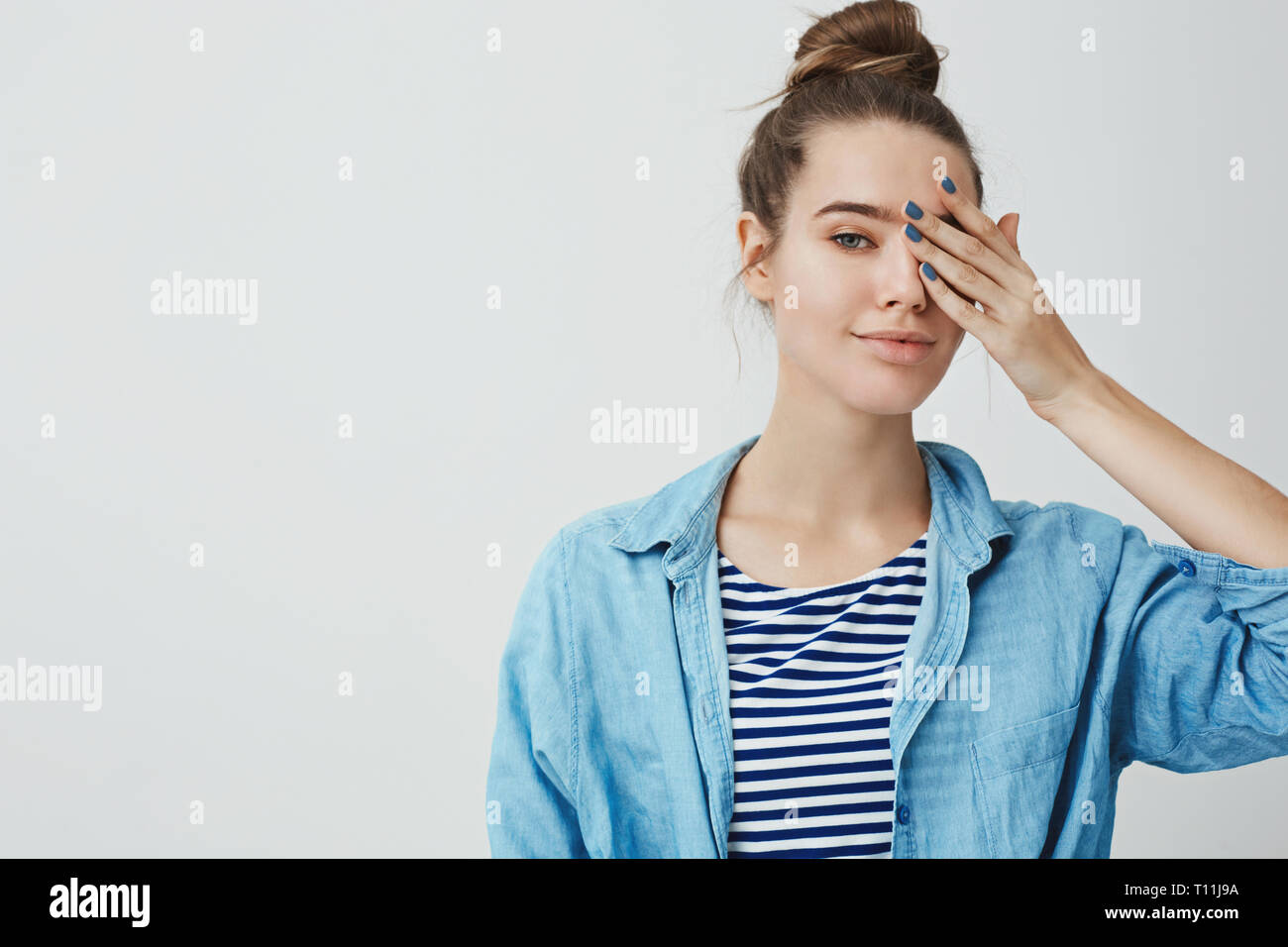 Dreamy carefree sensual good-looking 25s caucasian girl hairbun, palm ...