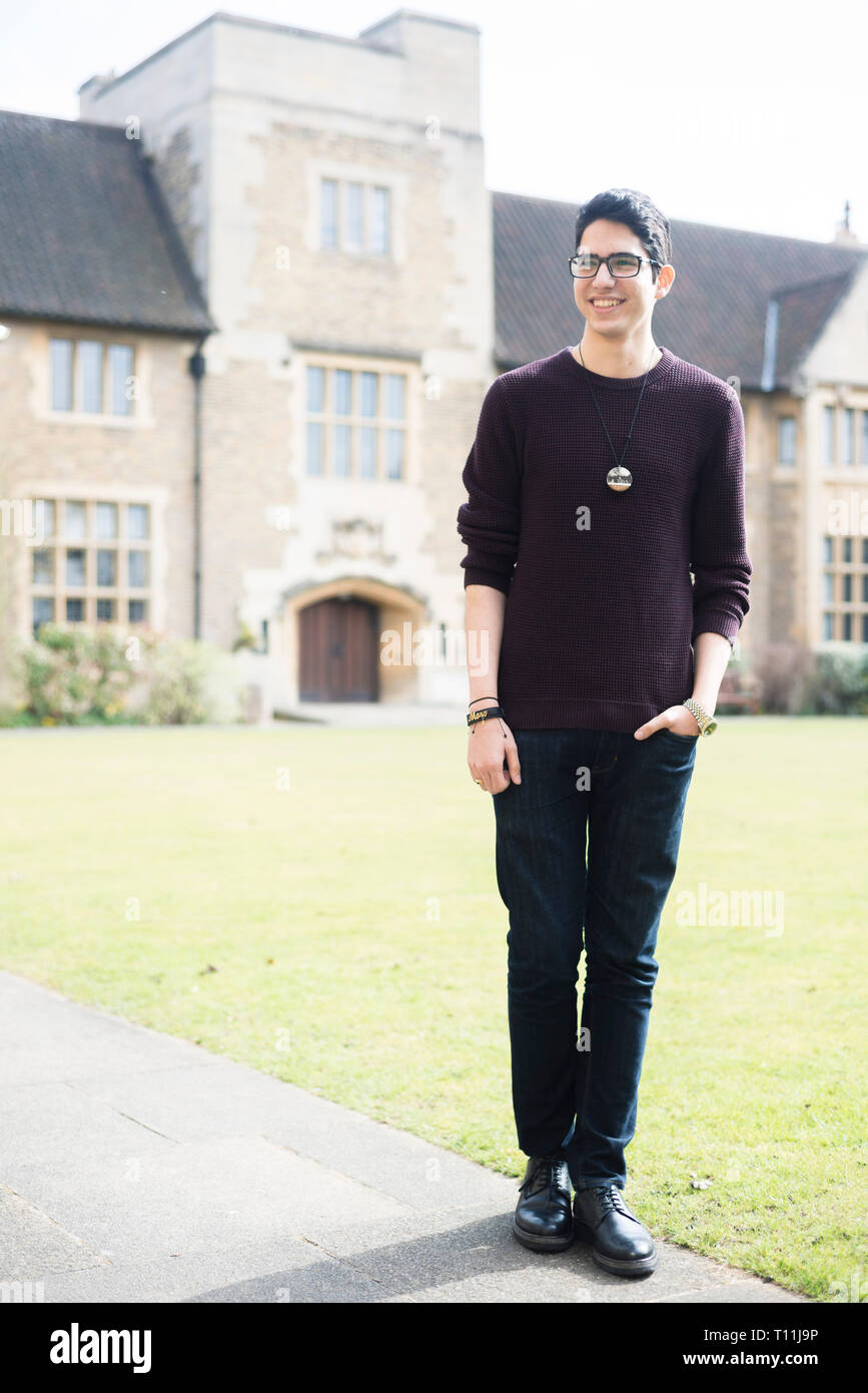 A confident male Middle Eastern international student in the square of ...