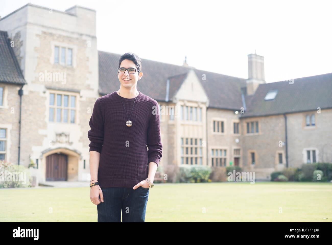 A confident male Middle Eastern international student in the square of ...