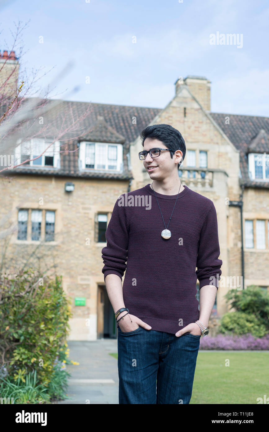 A confident male Middle Eastern international student in the square of ...