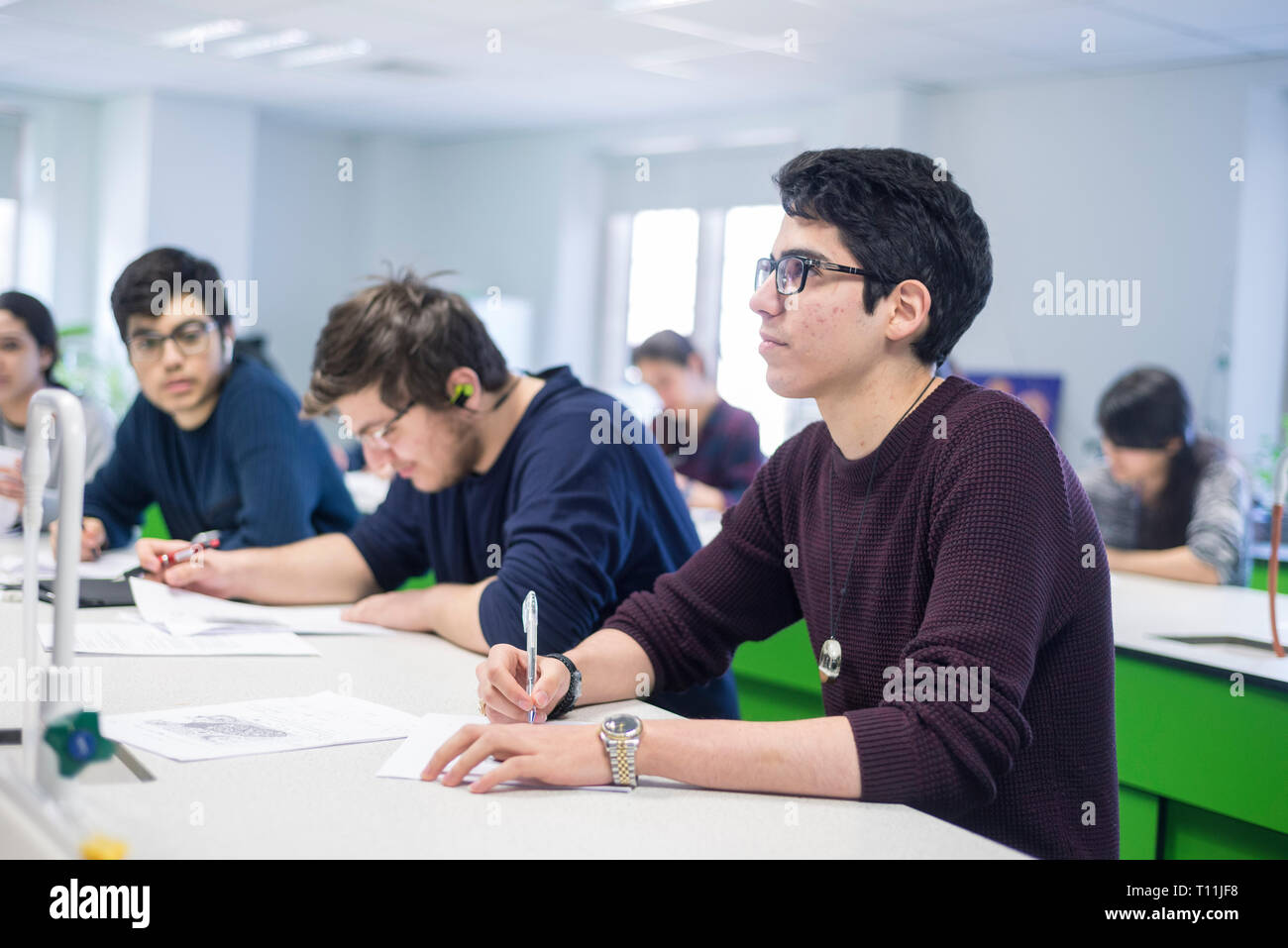 A classroom full of international students during a science lesson ...